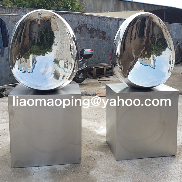 Abstract stainless steel egg sculpture