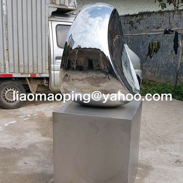 Abstract stainless steel egg sculpture