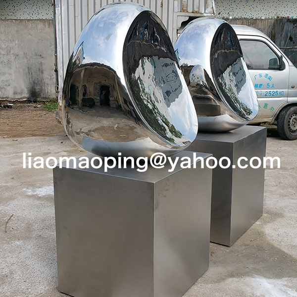 Abstract stainless steel egg sculpture