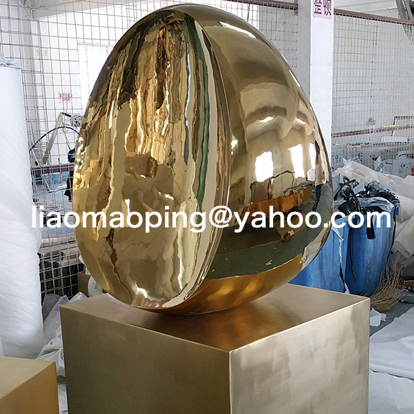 Abstract stainless steel egg sculpture